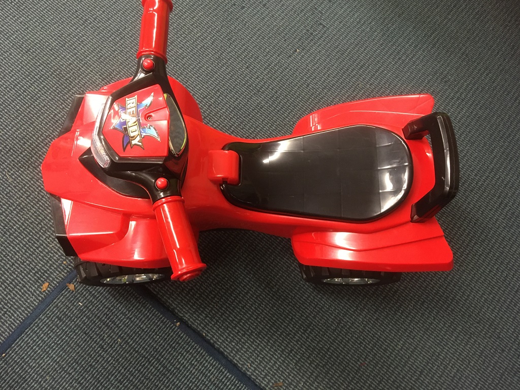 Red Plastic Dirt Bike